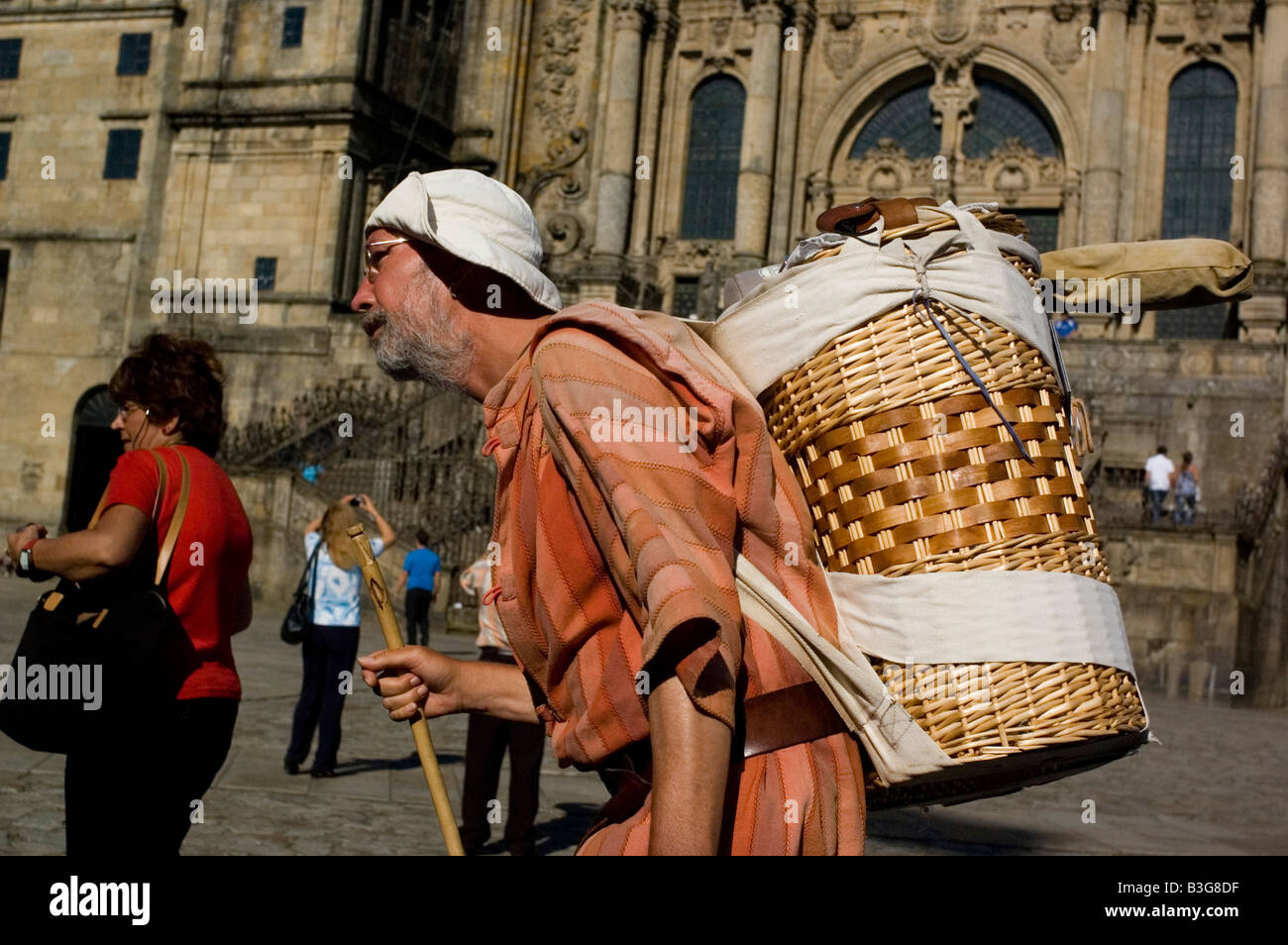 Pilgrim walking the WAY OF SAINT JAMES or CAMINO DE SANTIAGO in front ...