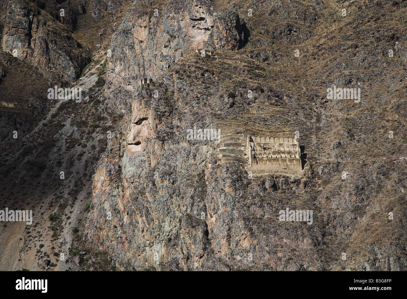 The mountain towers over the town of Ollantaytambo, site of huge Inca ...