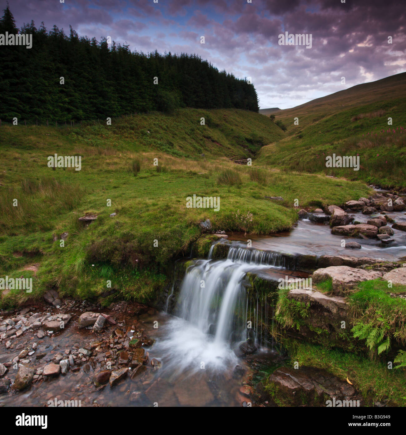 A small waterfall at the beginning of the walk to Pen-y-fan and Corn Du ...