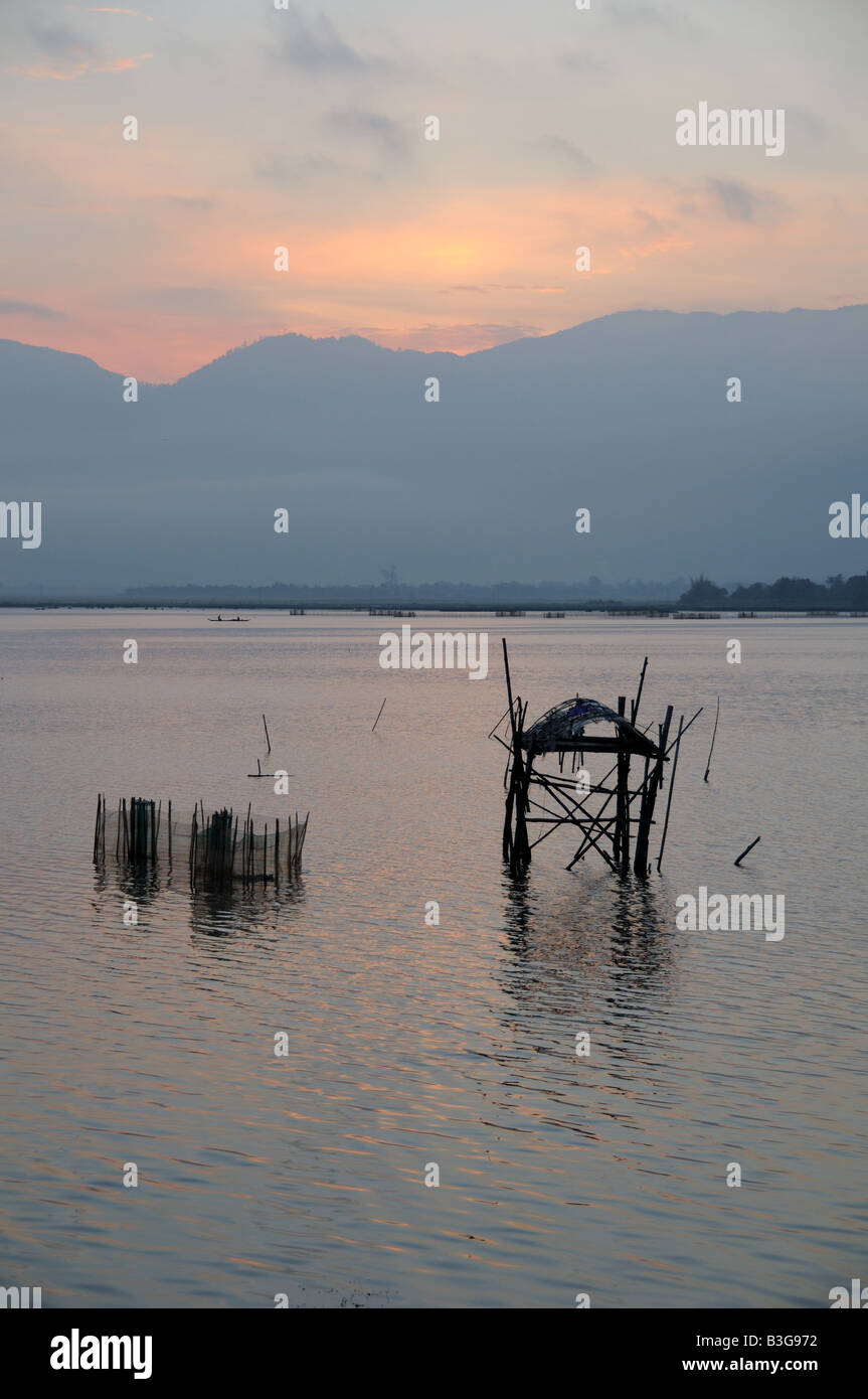 Sunrise over Lak Lake Vietnam Stock Photo - Alamy