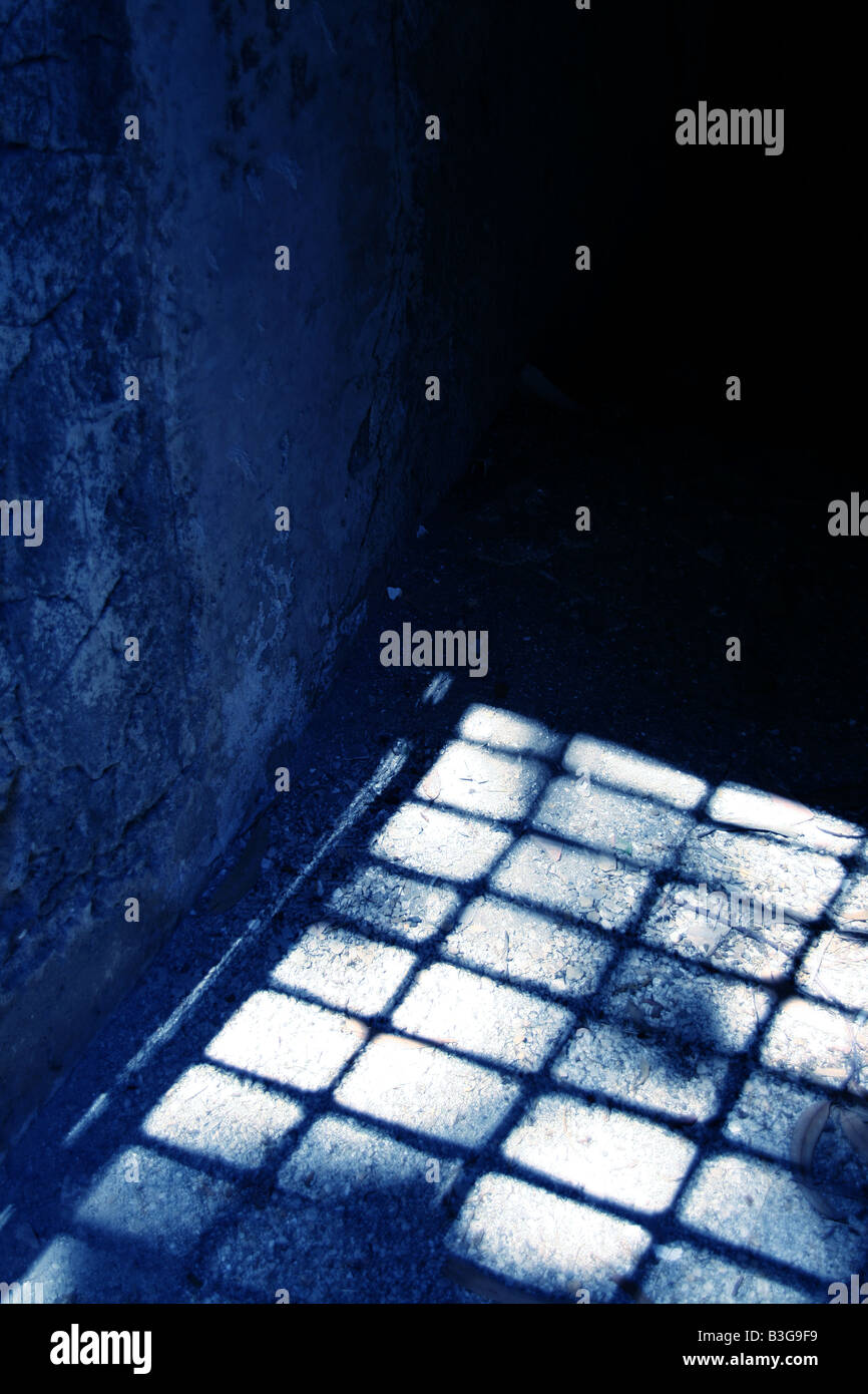 one high dark prison cell window with metal bars Stock Photo - Alamy