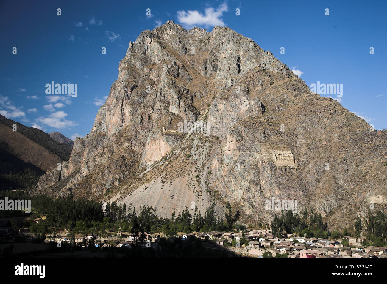 The mountain towers over the town of Ollantaytambo, site of huge Inca ...