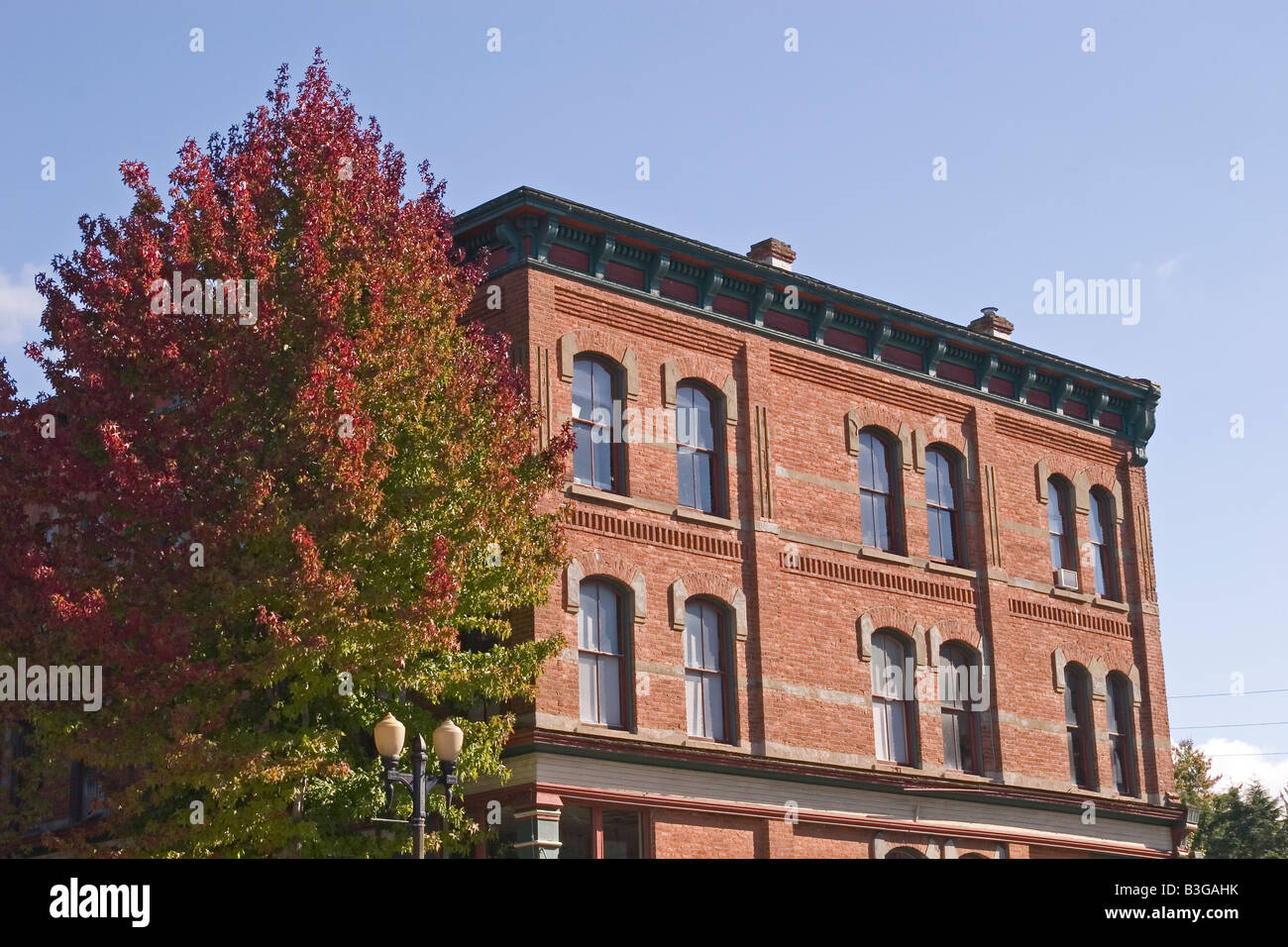 An old brick building converted to lofts in the fall Stock Photo - Alamy