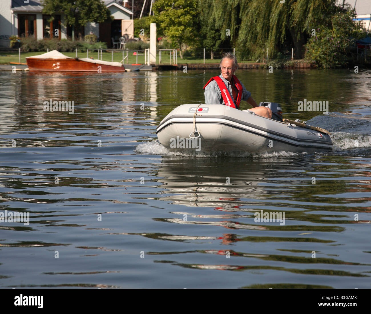 man in inflatable boat Stock Photo - Alamy