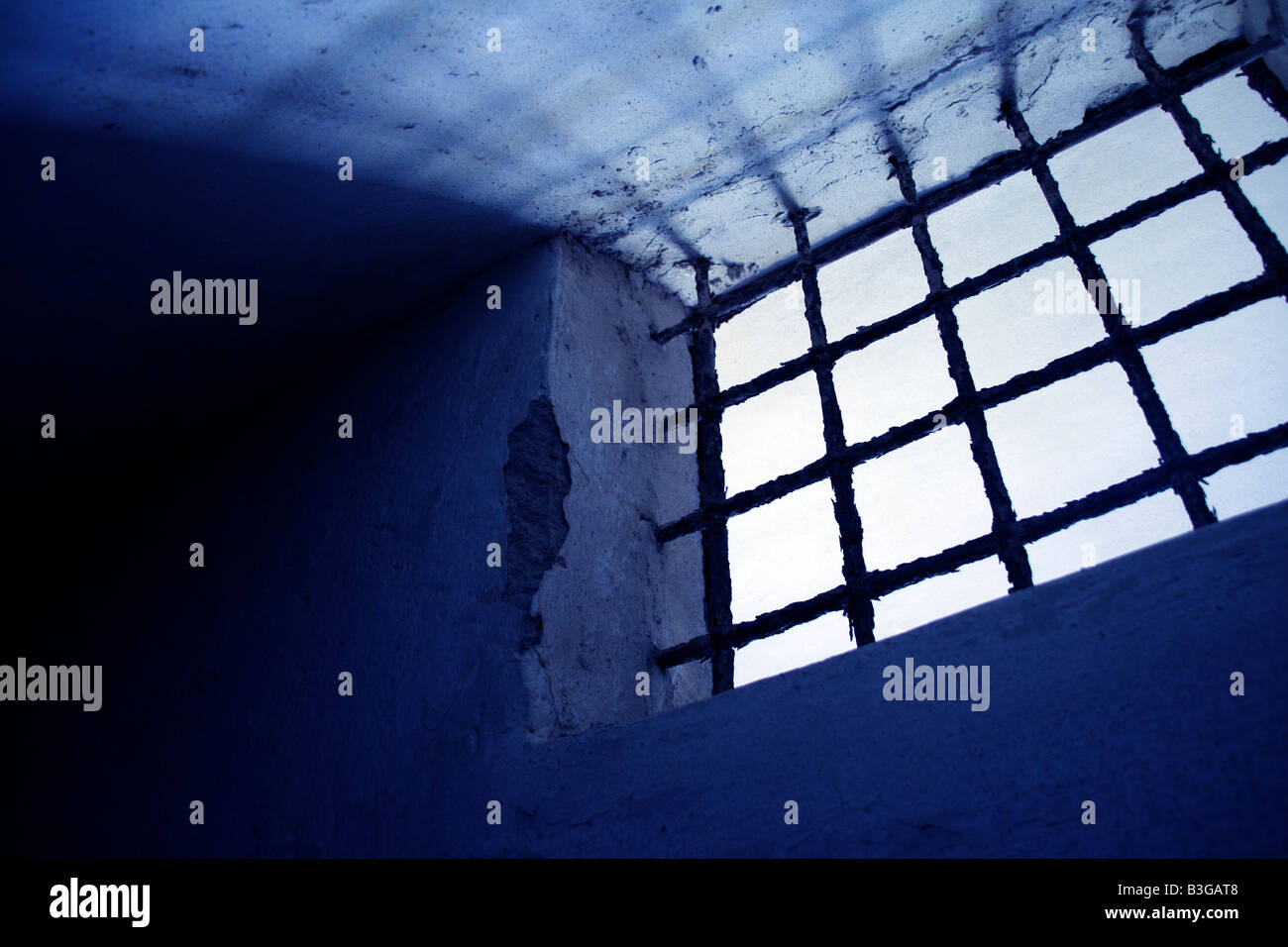 one high dark prison cell window with metal bars Stock Photo - Alamy