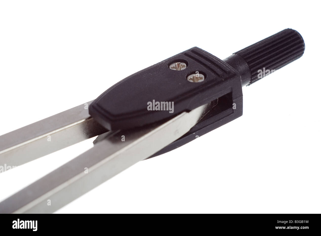 Macro of compasses over white background Stock Photo - Alamy