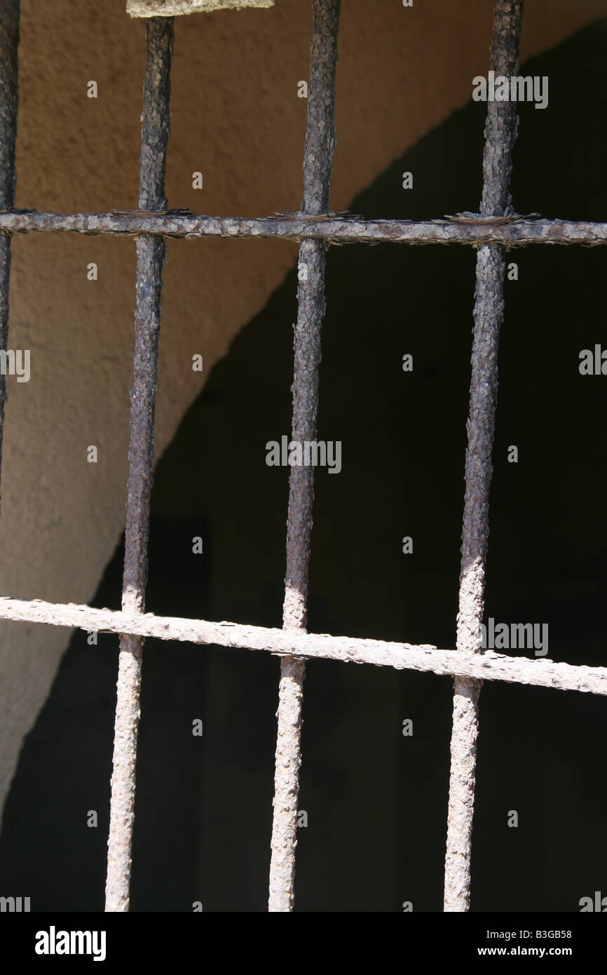 one high dark prison cell window with metal bars Stock Photo - Alamy