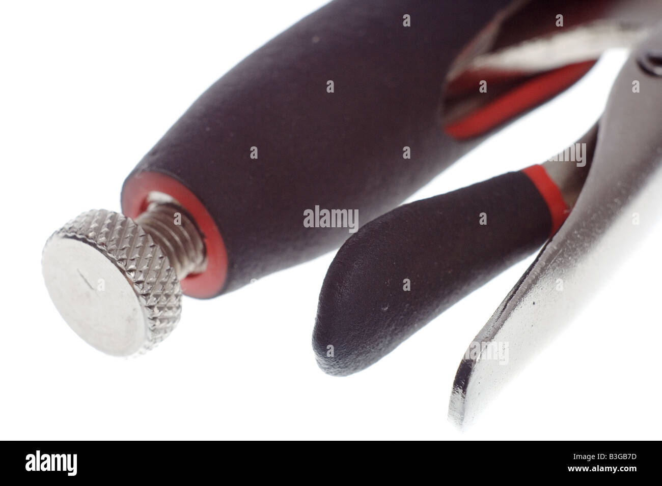 Mole wrench grip macro over white background Stock Photo - Alamy
