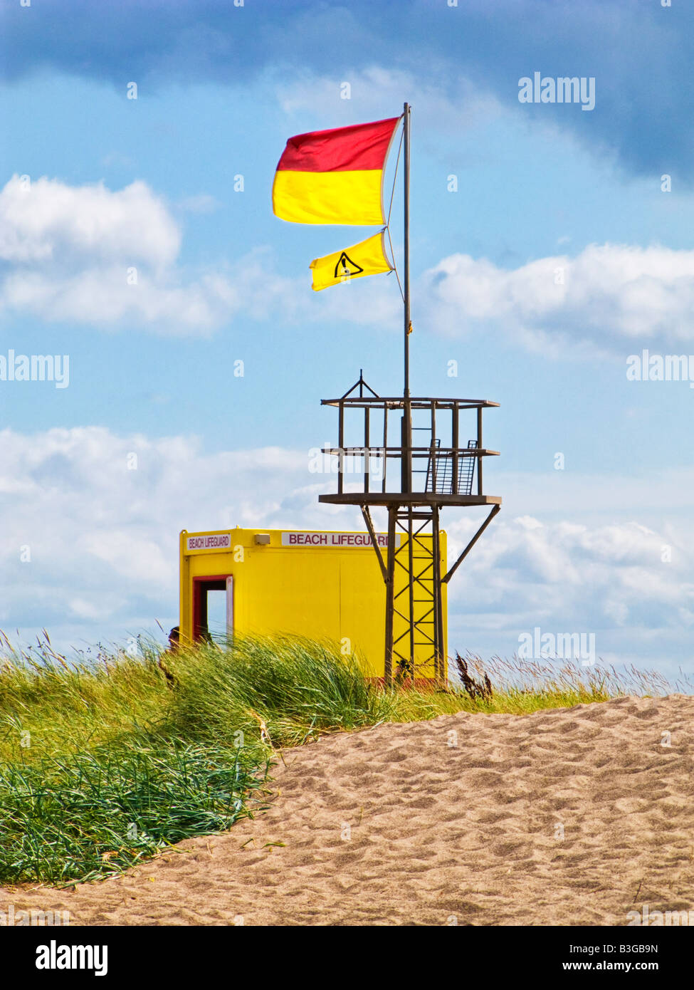 English Beach Lifeguard hut with Safe Bathing flag England UK Stock ...