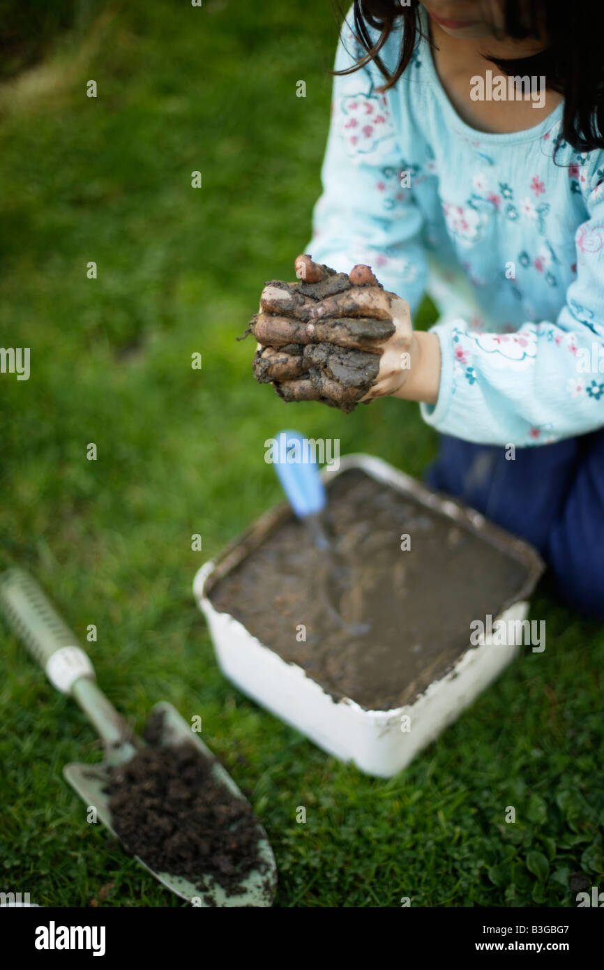 Mud play hands hi-res stock photography and images - Alamy