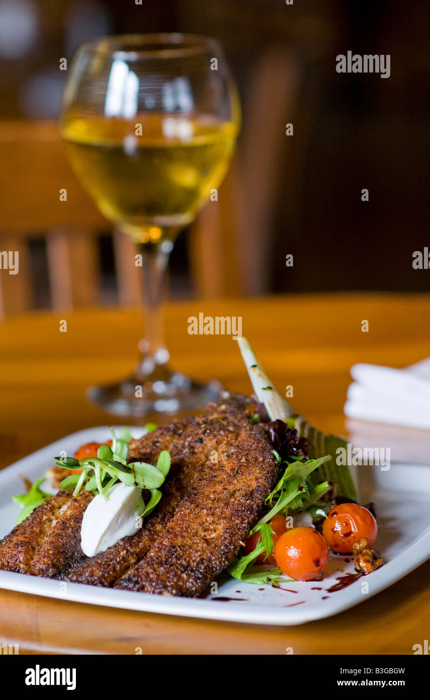 An entree of trout and white wine Stock Photo - Alamy