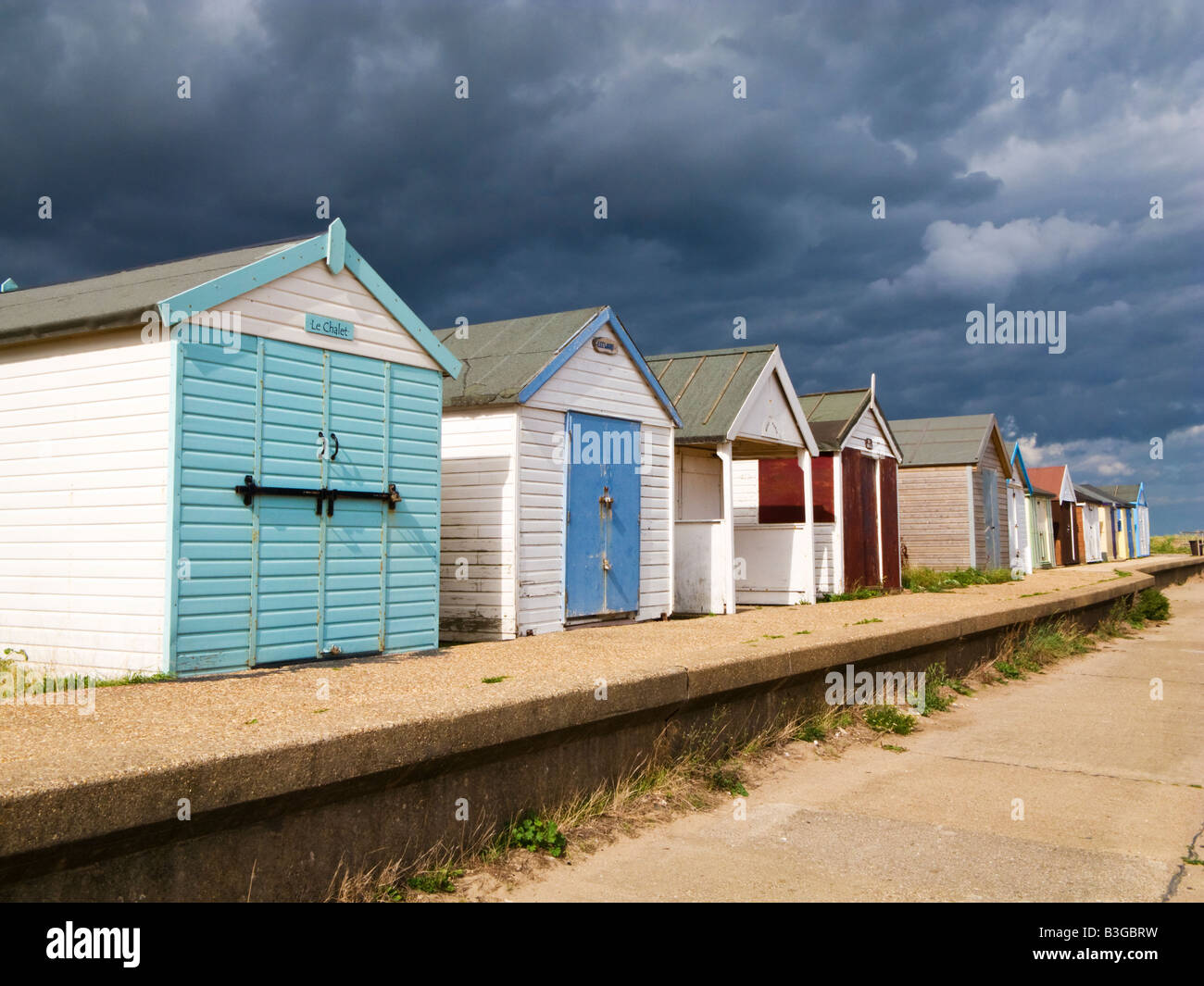 Row of painted old wooden bathing huts at Chapel Point, Chapel St ... Row of painted old wooden bathing huts at Chapel Point, Chapel St ...