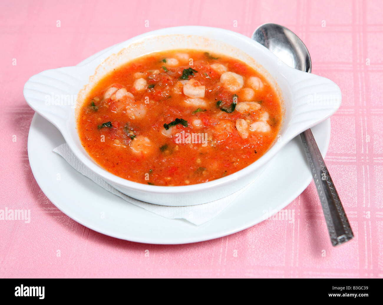 A traditional greek starter of shrimps cooked with tomatoes cheese ...