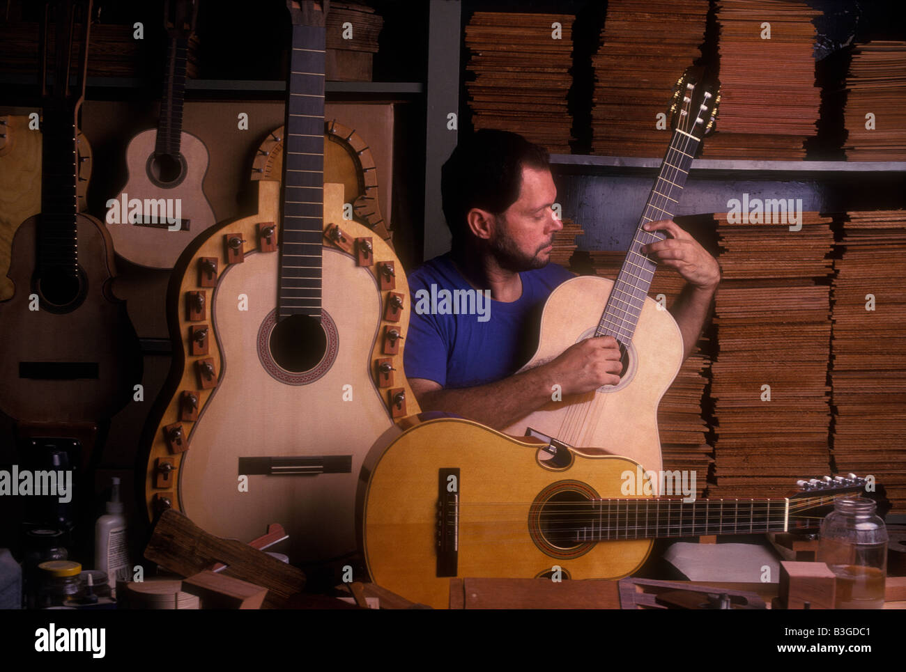 Musical instruments maker hi-res stock photography and images - Alamy