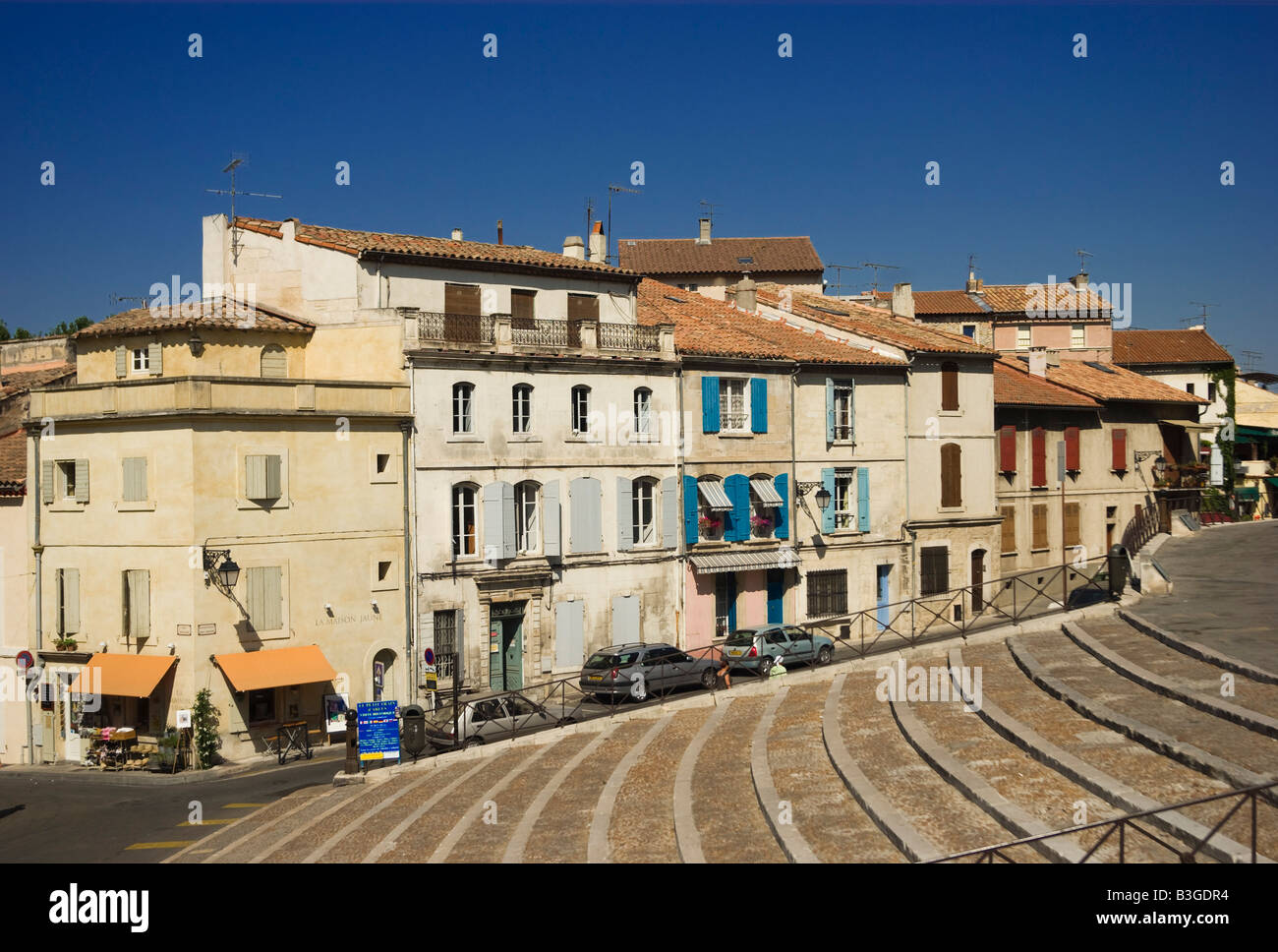 Street scene Arles Provence France with steps of the Arena in the ...
