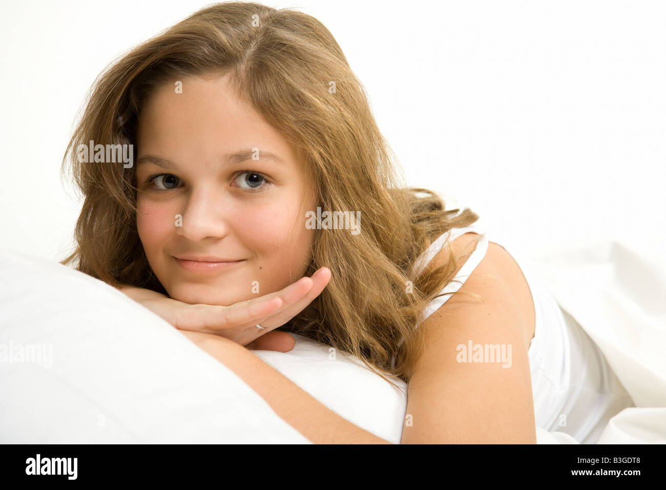 Young caucasian girl in bed Stock Photo - Alamy