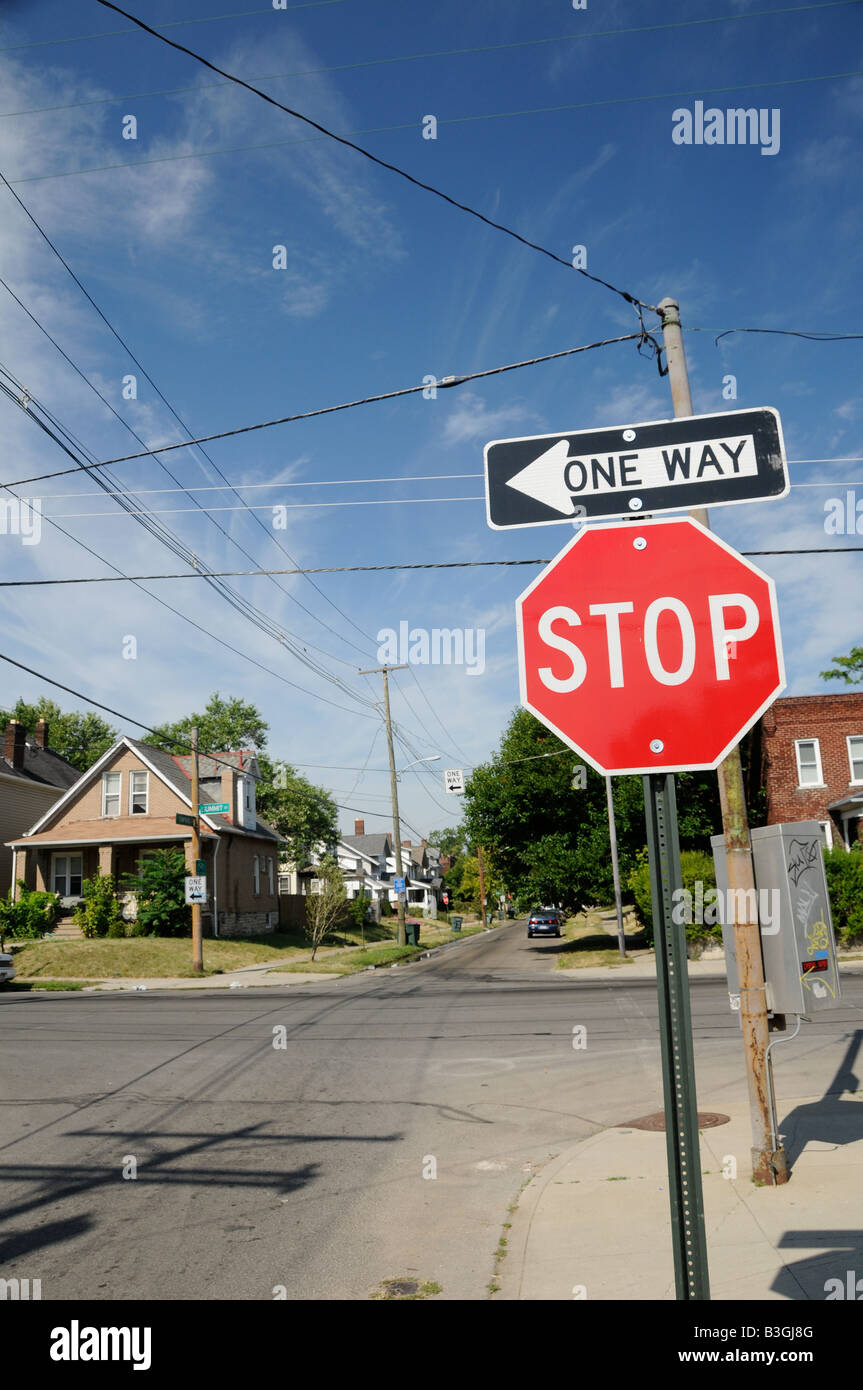 One way and stop sign in an urban setting Stock Photo - Alamy