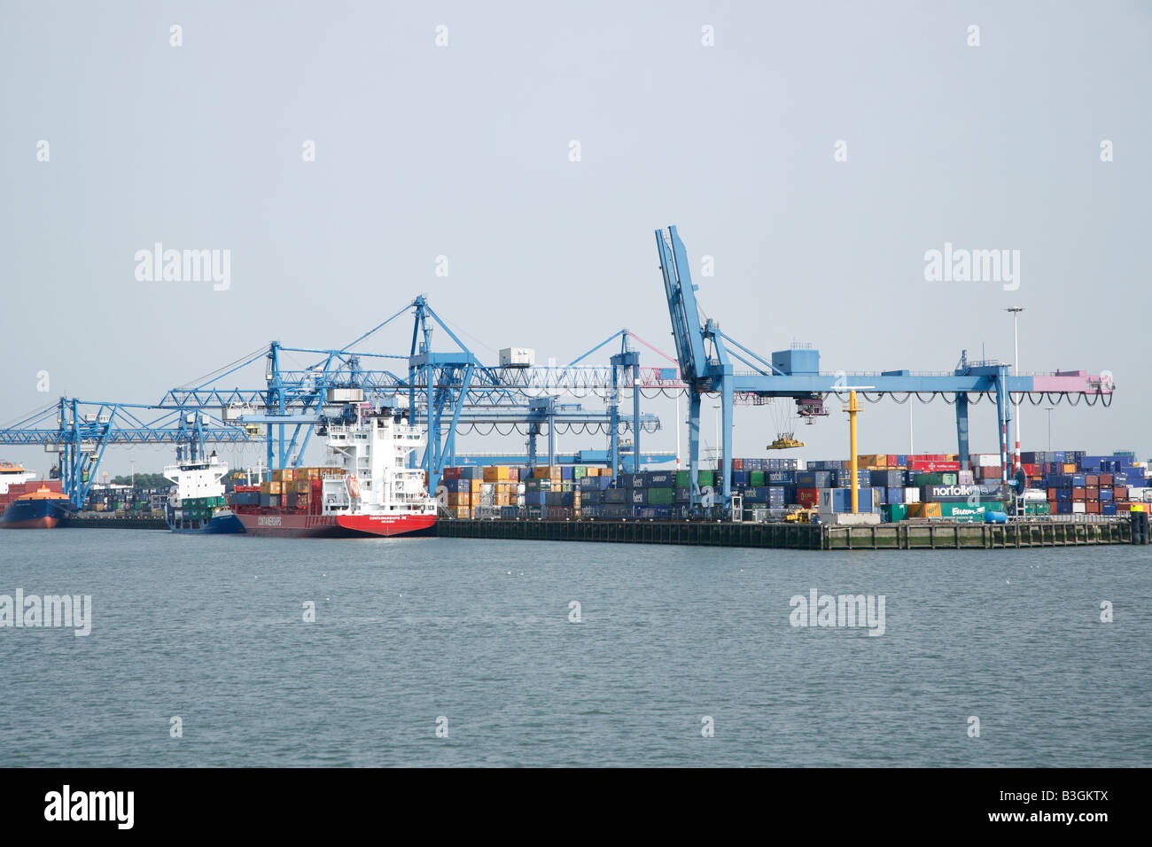 Port cranes, ship and cargo containers, Port Rotterdam, Netherlands ...