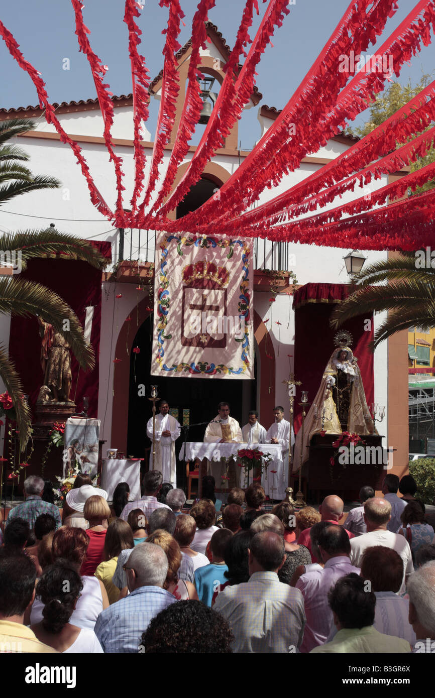 A Catholic mass service outside the church to celebrate the Fiesta of ...