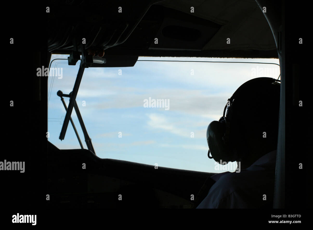 Pilot flying an aircraft Stock Photo - Alamy