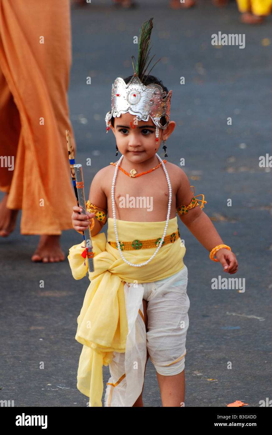 Little Krishna- a small boy posing as lord krishna in a balagokulam ...