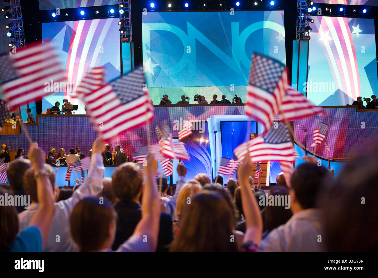 Artistic image of flags waving in fron of the DNC symbol at the 2008 ...