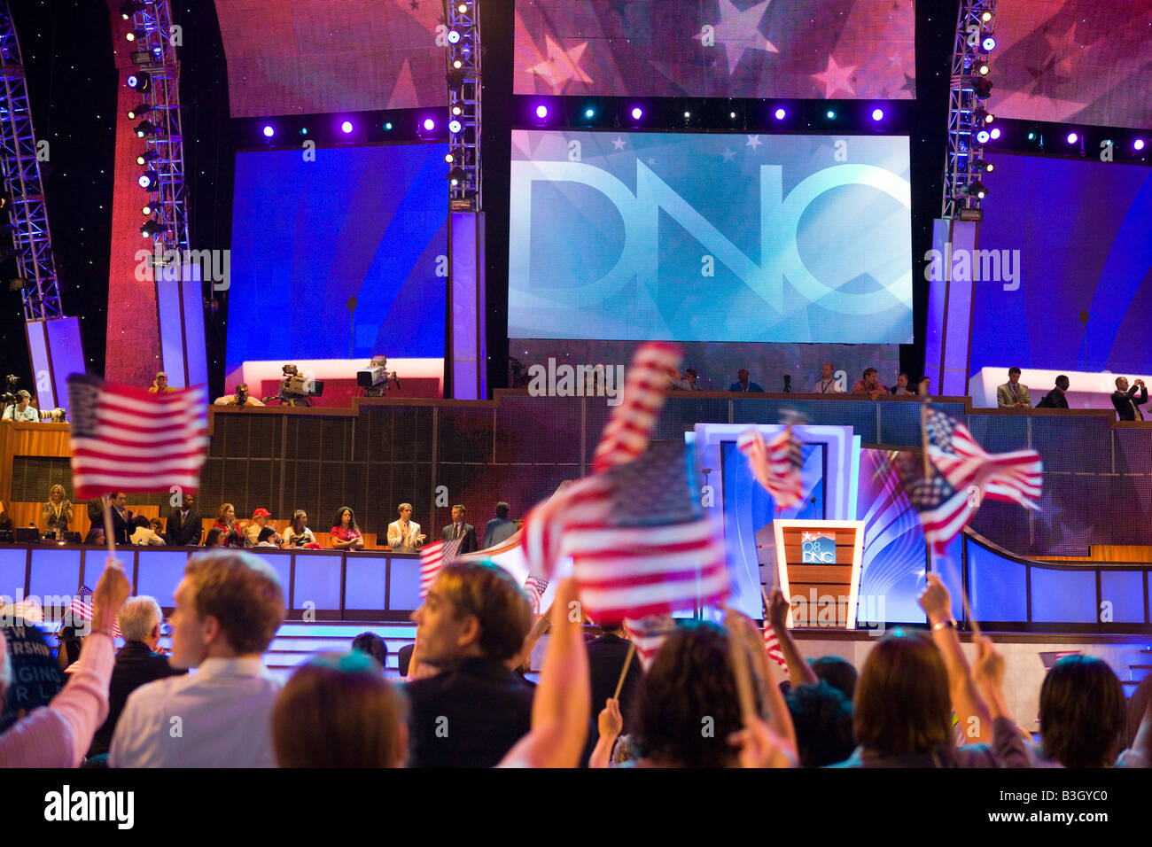 Artistic image of flags waving in fron of the DNC symbol at the 2008 ...
