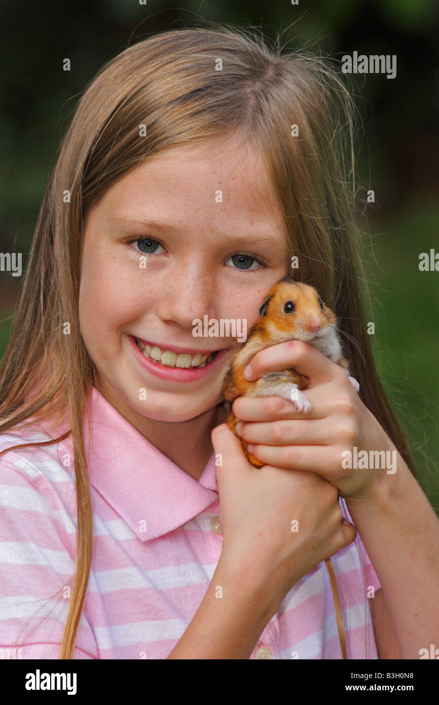 Young girl holding her pet hamster Vancouver British Columbia Canada ...
