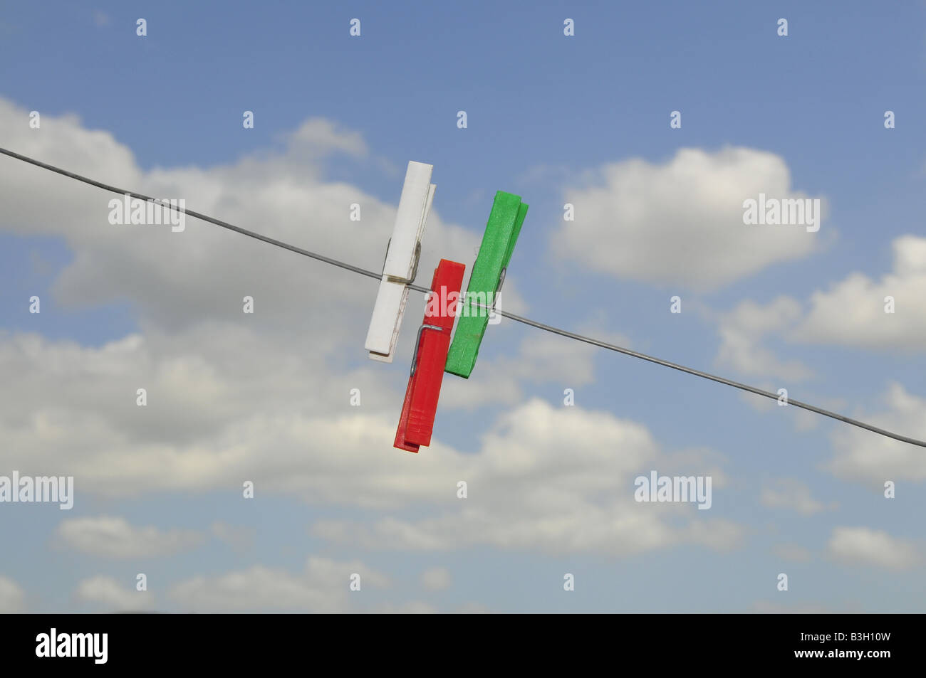 italian flag by means of three pegs Stock Photo - Alamy