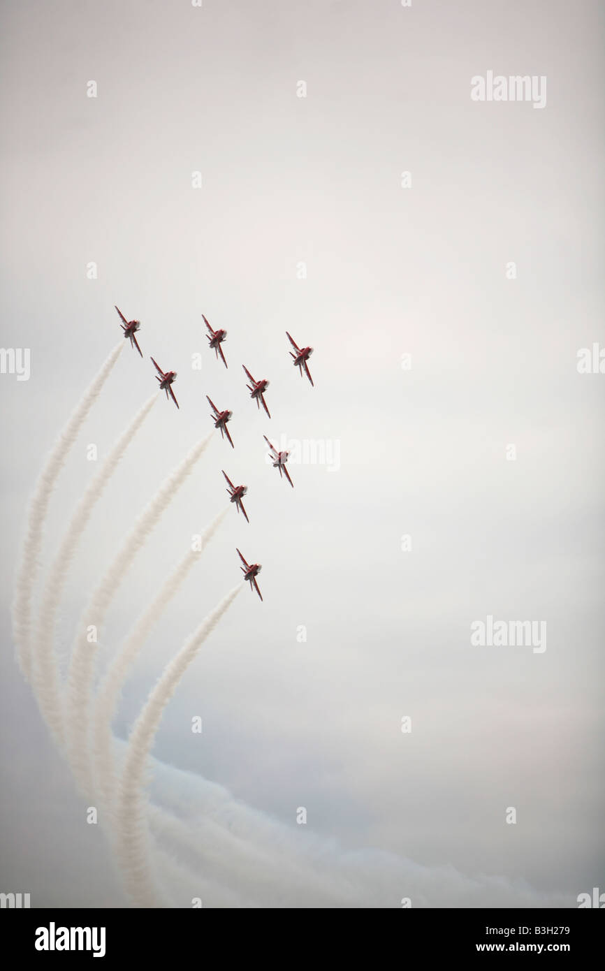 Red Arrows fly in formation at the Bournemouth Air Show Stock Photo - Alamy