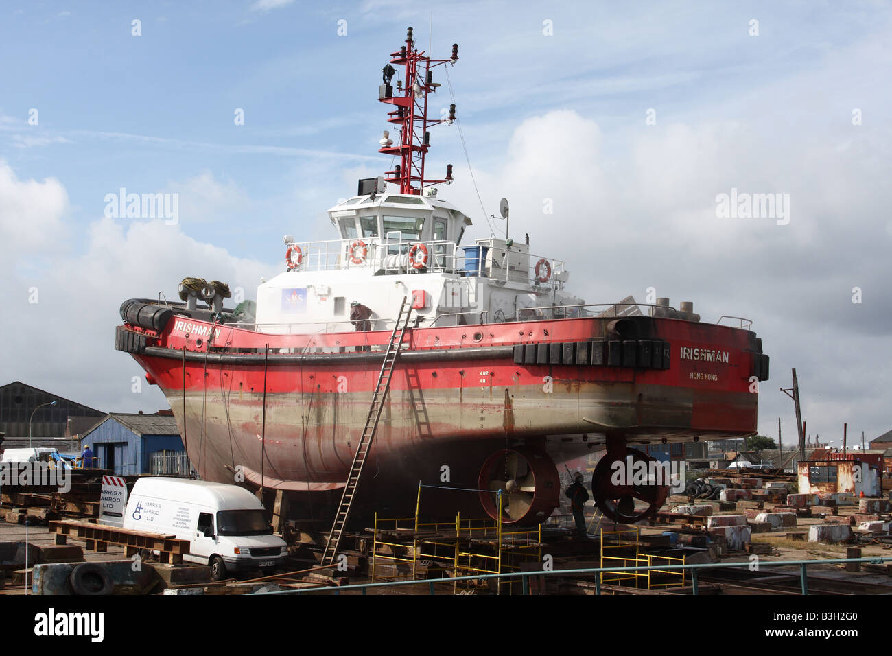 A fishing trawler undergoing maintenance work on a slipway at Grimsby ...