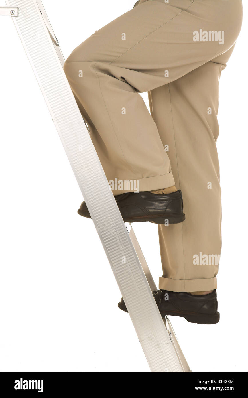 Man climbing a ladder Stock Photo - Alamy