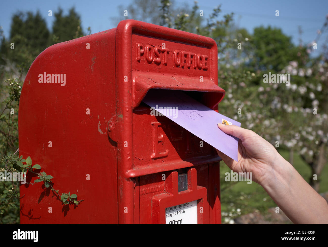Mailing a letter hi-res stock photography and images - Alamy