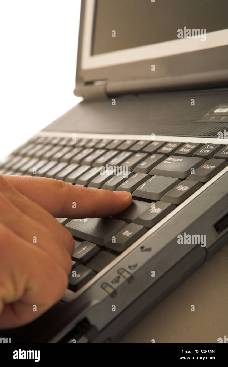 Typing on laptop Stock Photo - Alamy