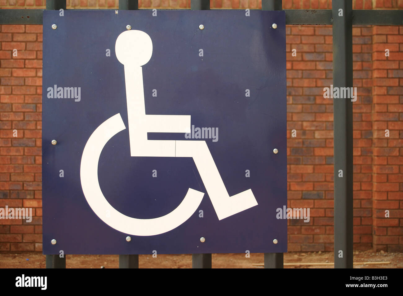 Blue disabled parking sign Stock Photo - Alamy