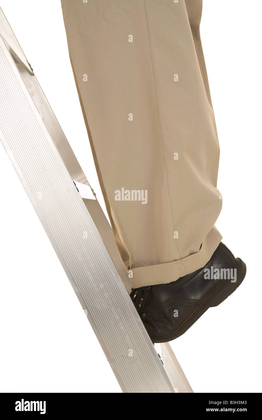 Man standing the corporate ladder Stock Photo - Alamy