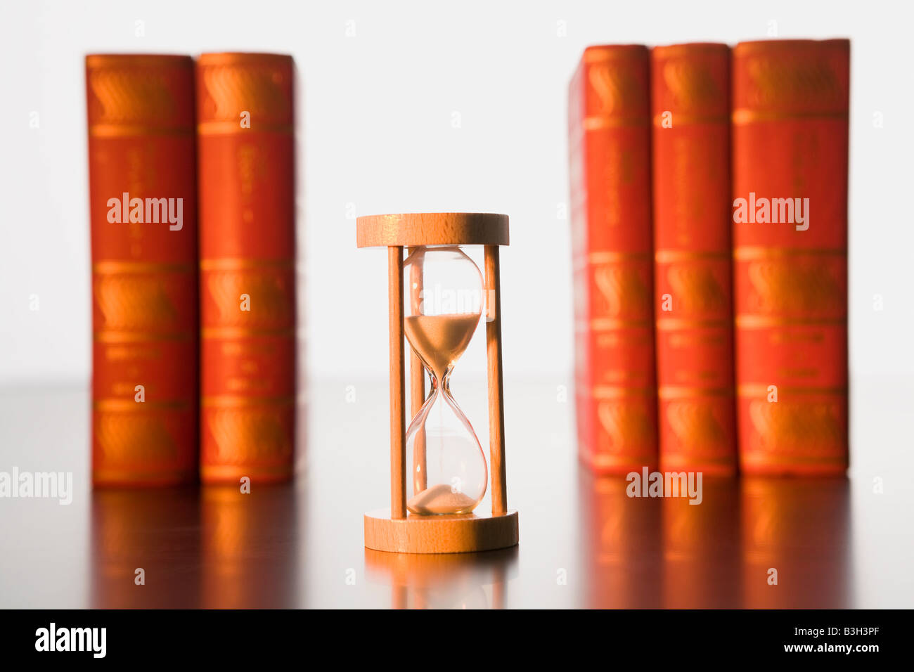 Hourglass book hi-res stock photography and images - Alamy