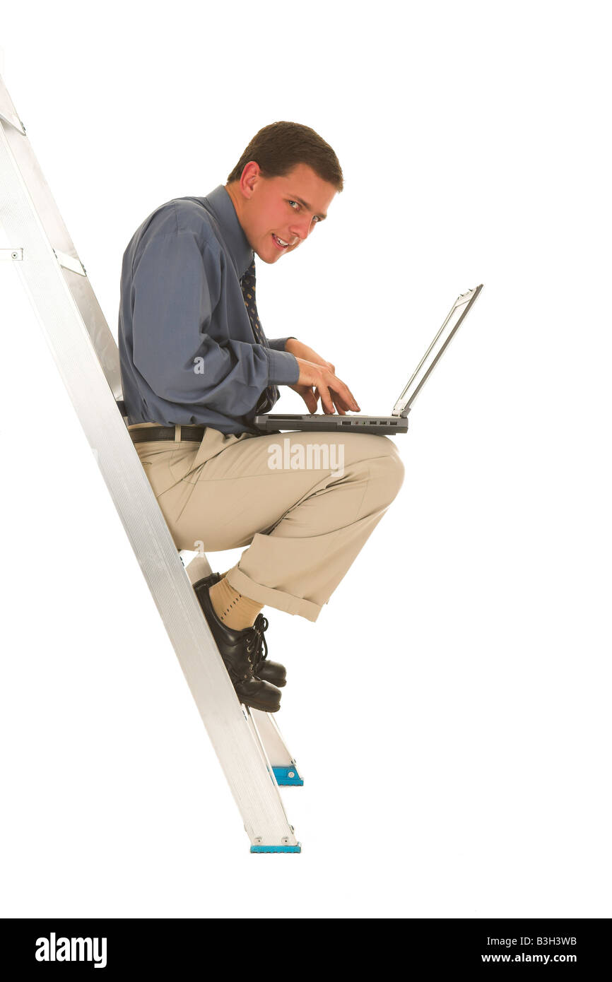 Man looking sneaky while working on laptop an a ladder Stock Photo - Alamy
