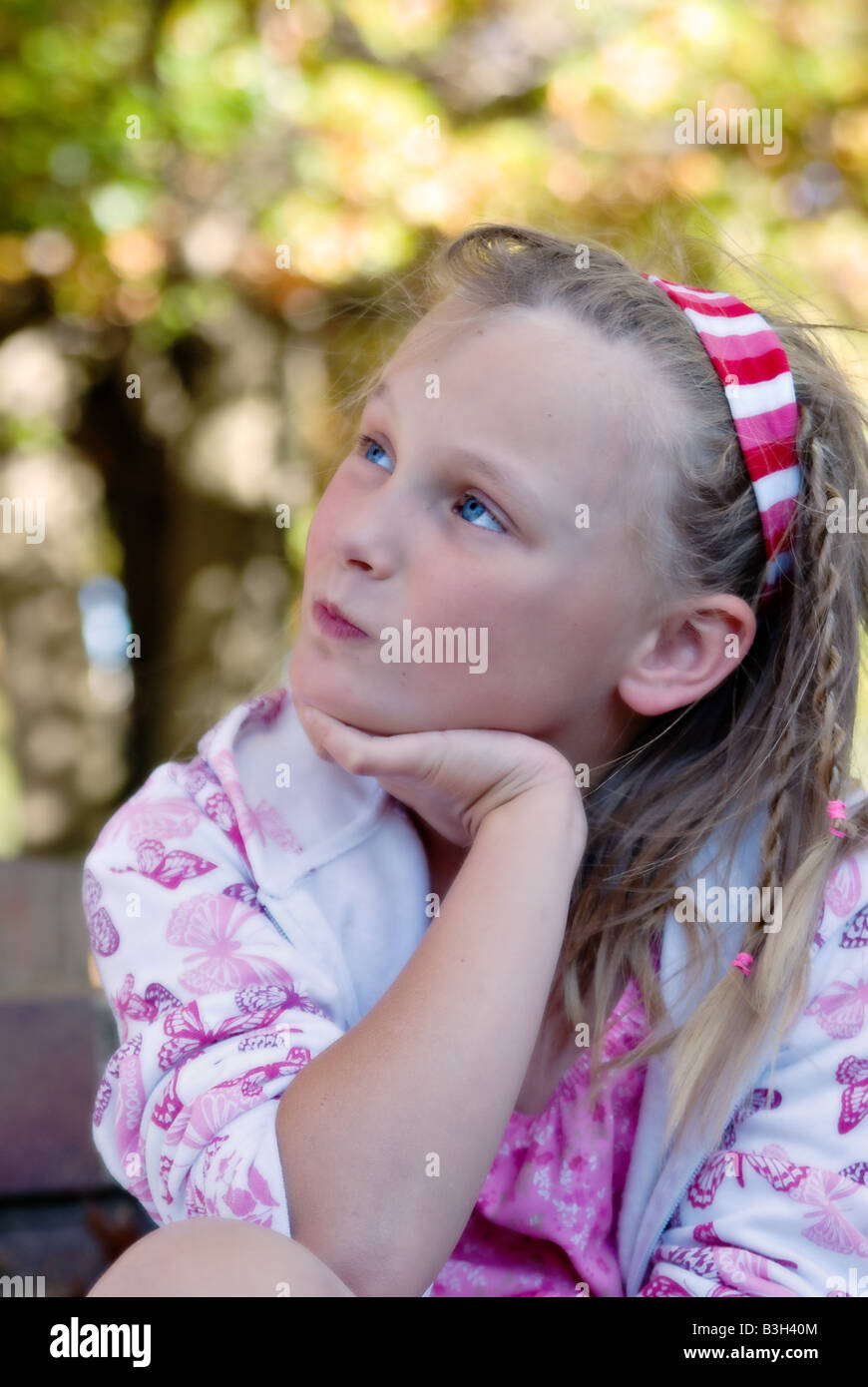 Wistful girl hi-res stock photography and images - Alamy