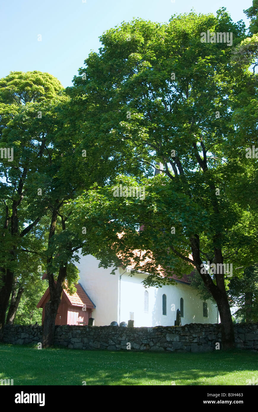 Tanum a medieval stone church at a scenic location in Baerum near Oslo ...