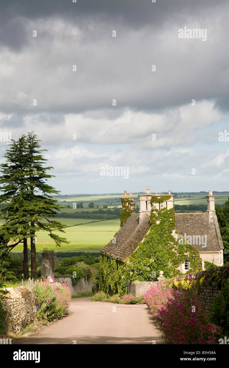 Ivy clad farm house and view across the Welland valley to the Vale of ...