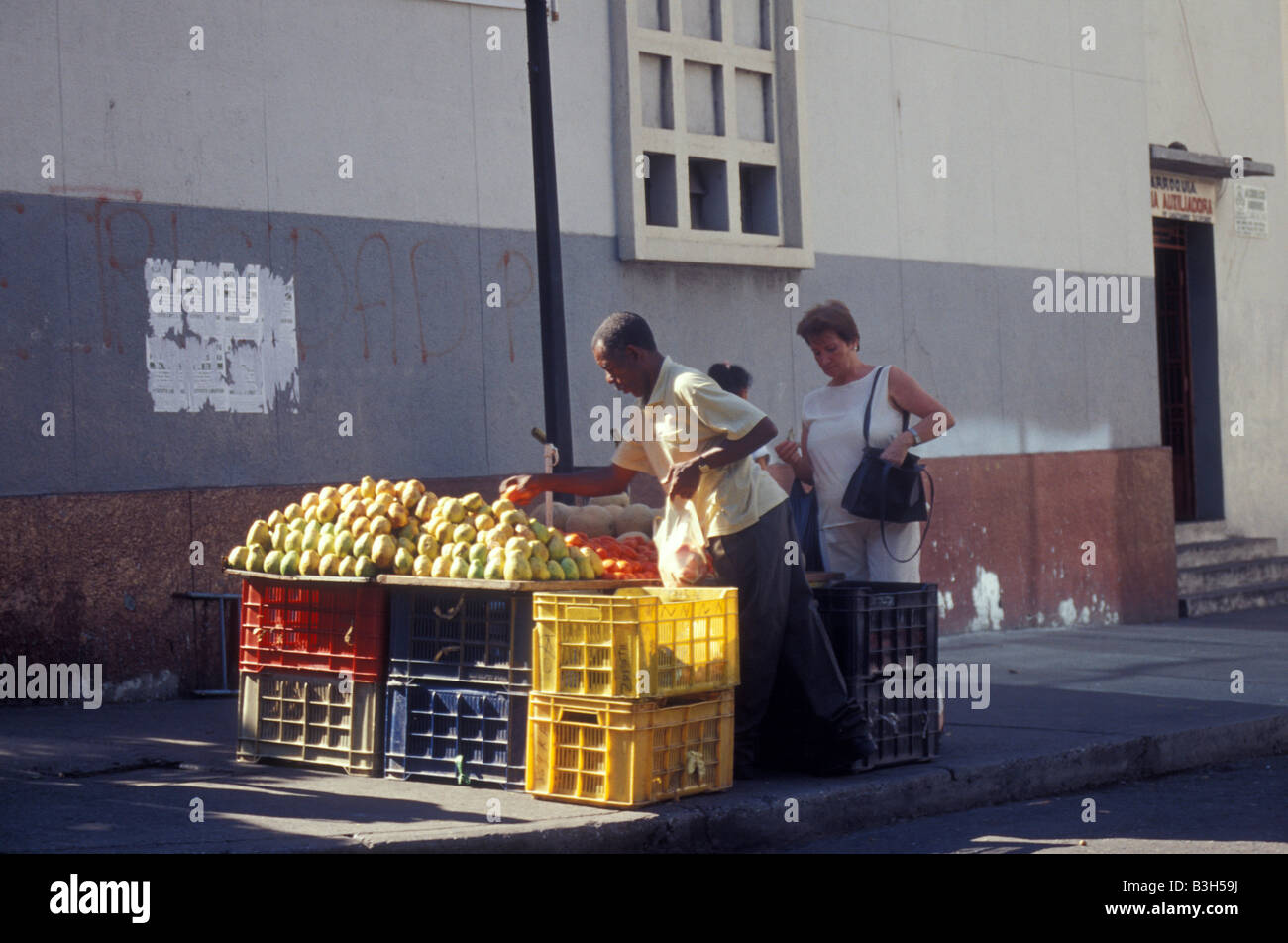 Sidewalk fruit and vegetables vendor in downtown Caracas, Venezuela ...
