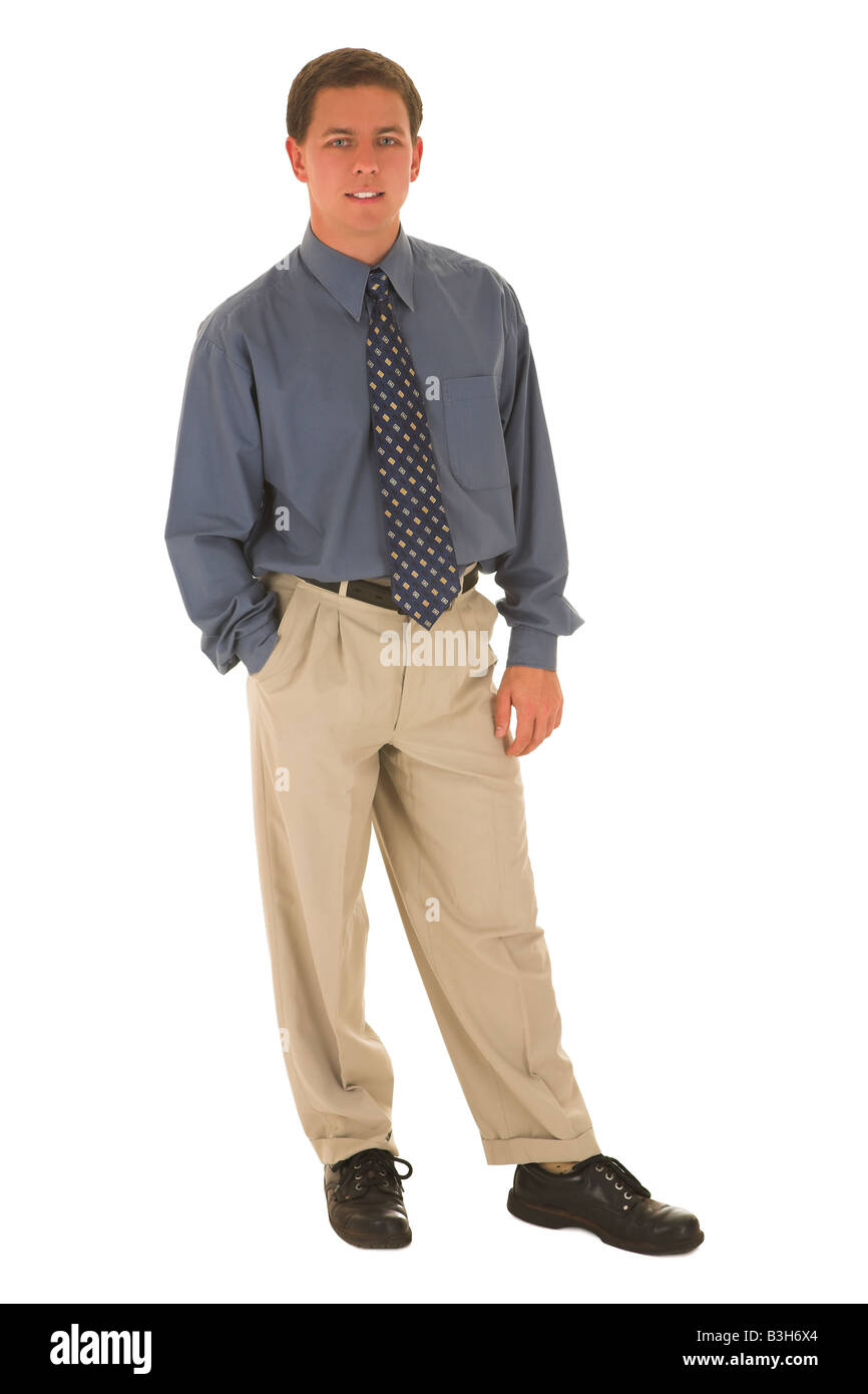 Business man standing with a smile Stock Photo - Alamy