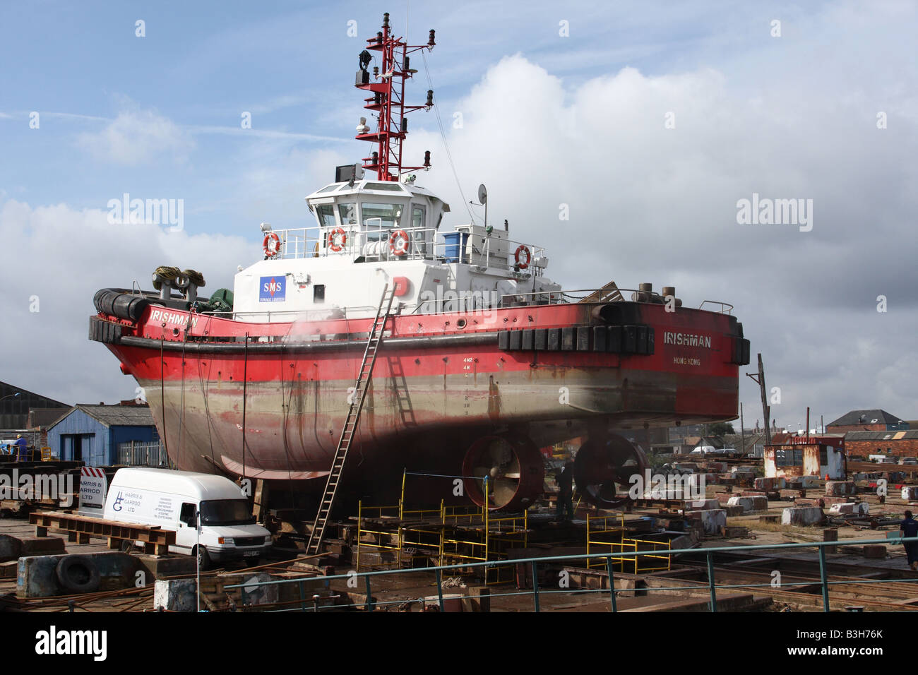 A fishing trawler undergoing maintenance work on a slipway at Grimsby ...