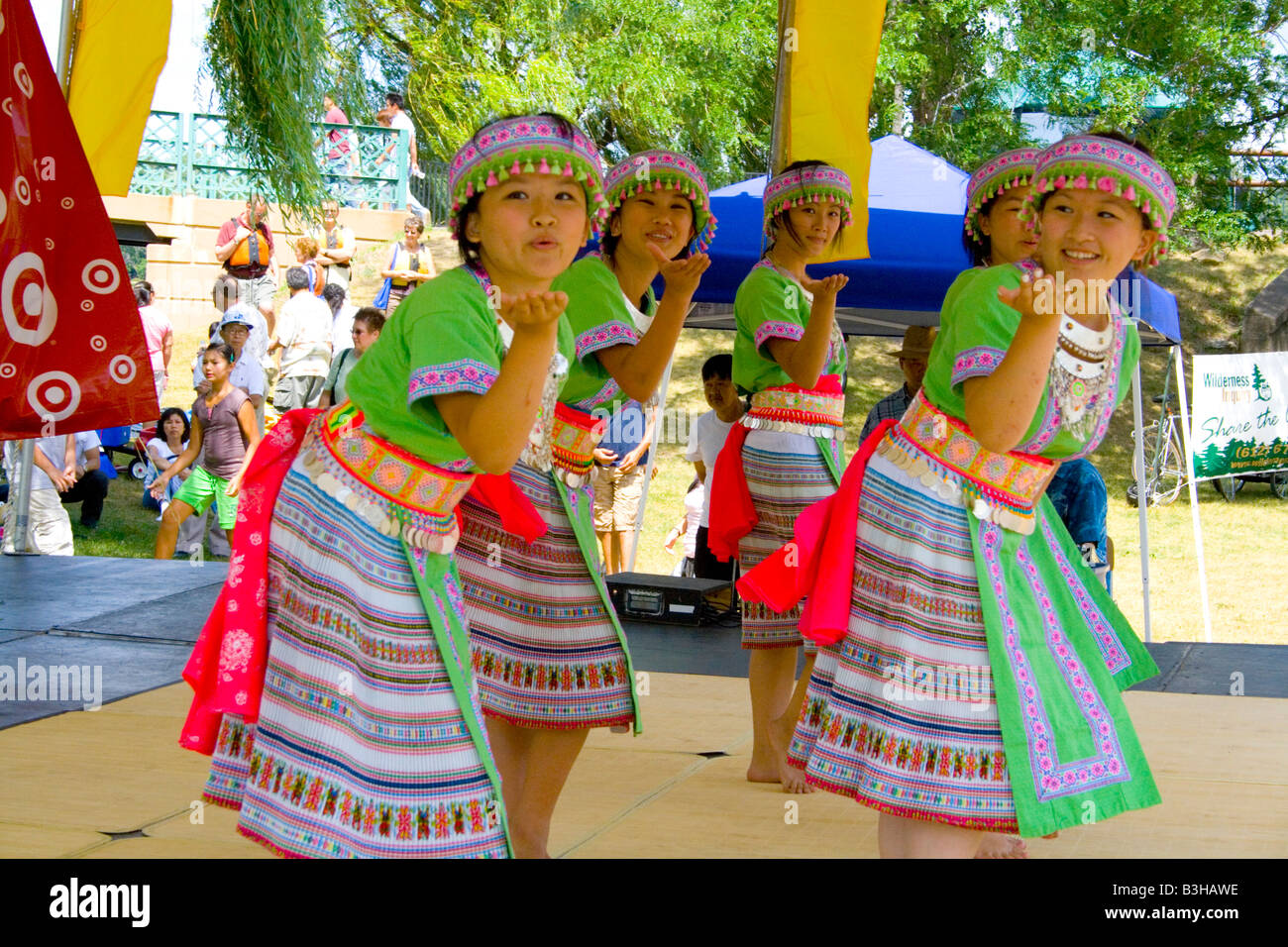 Hmong (Laos) American dance troop entertain in traditional costumes ...
