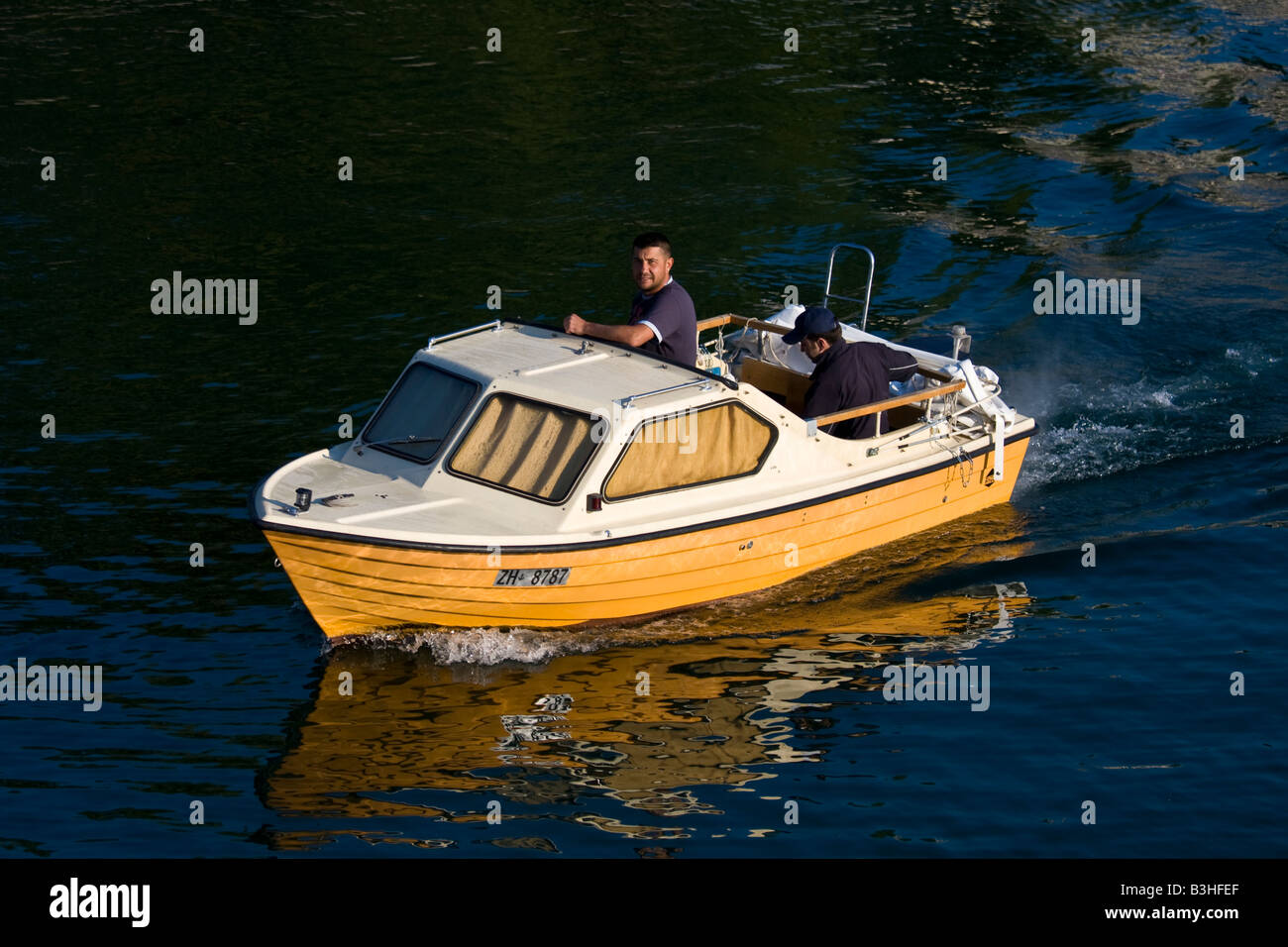 yellow motor boat Stock Photo - Alamy