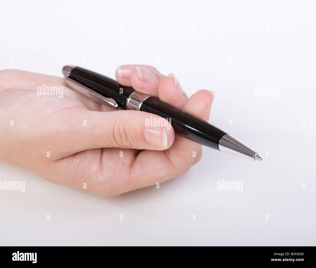 hand holding pen Stock Photo - Alamy