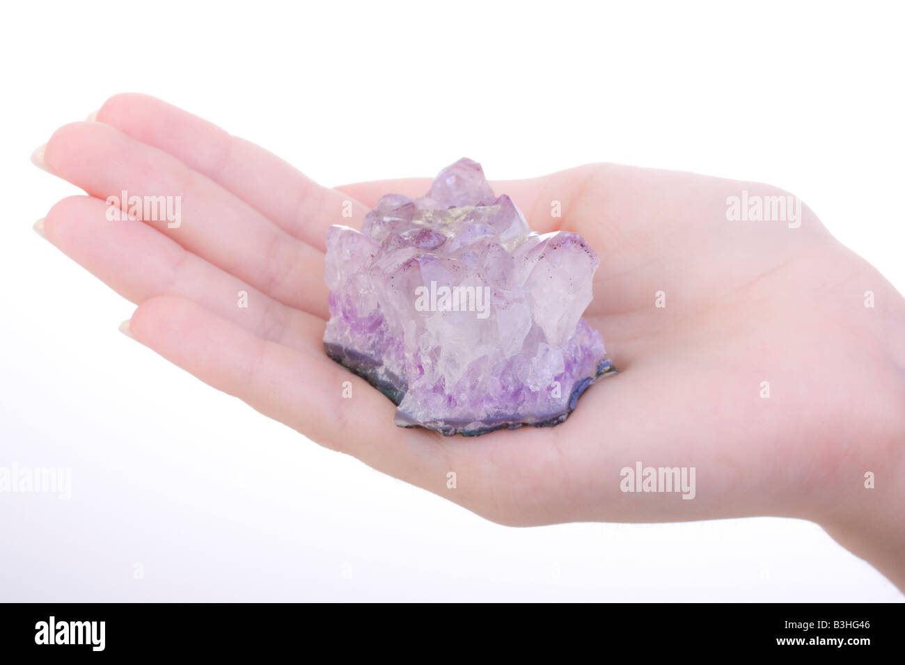 Hand holding amethyst hi-res stock photography and images - Alamy