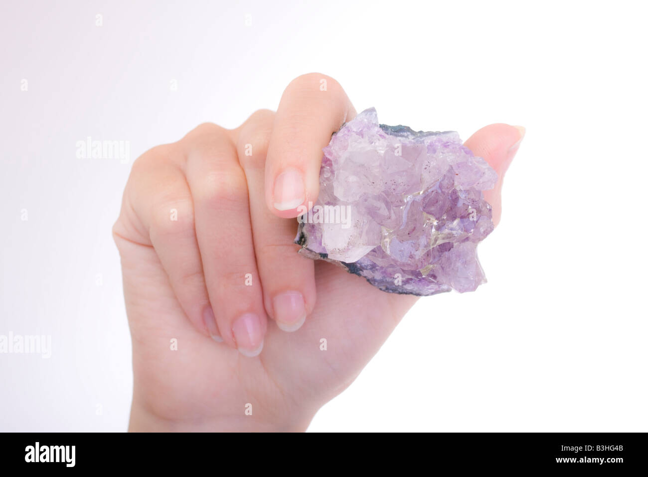 hand holding amethyst Stock Photo - Alamy