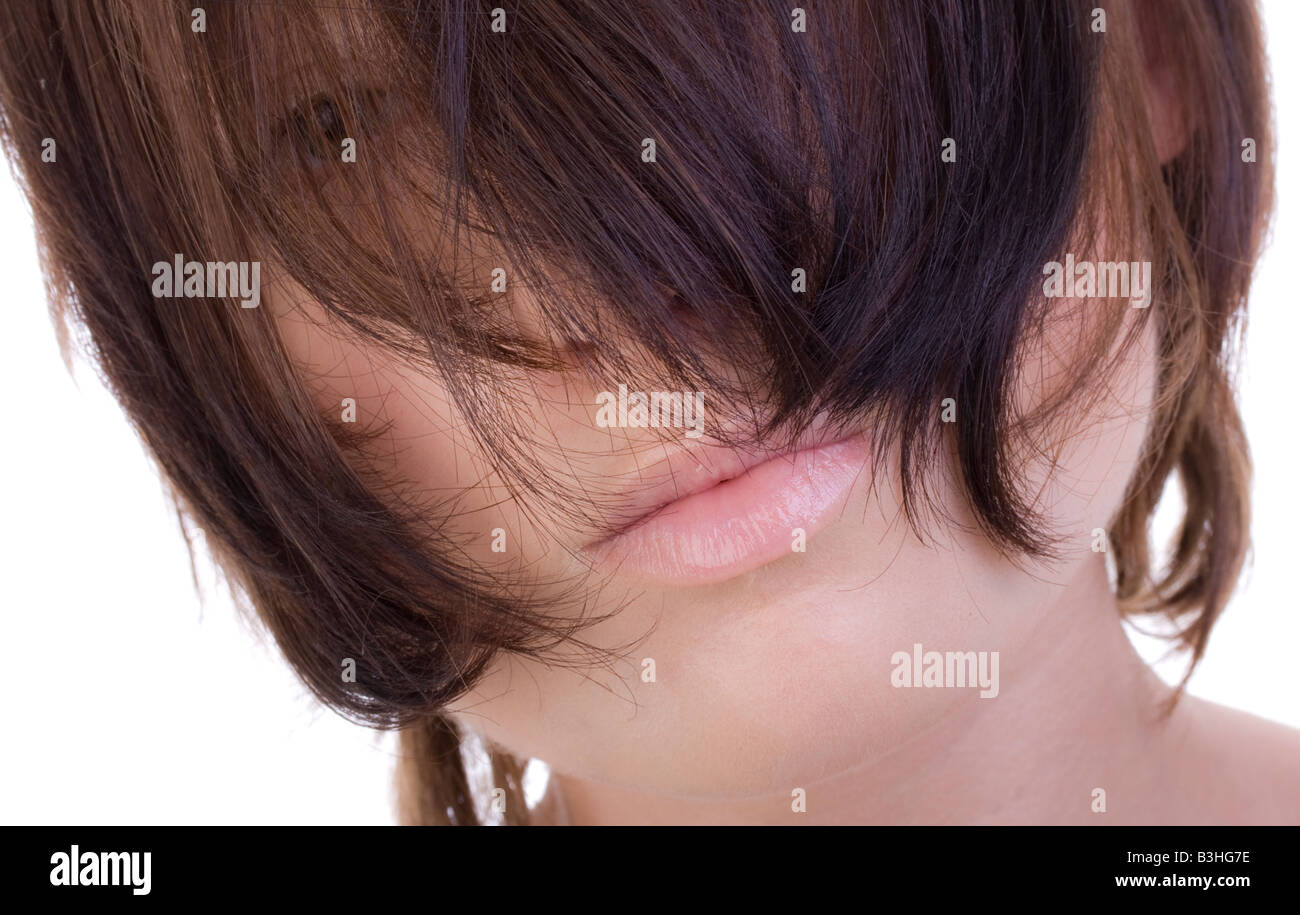 beautiful young woman has covered the face with her hair Stock Photo ...